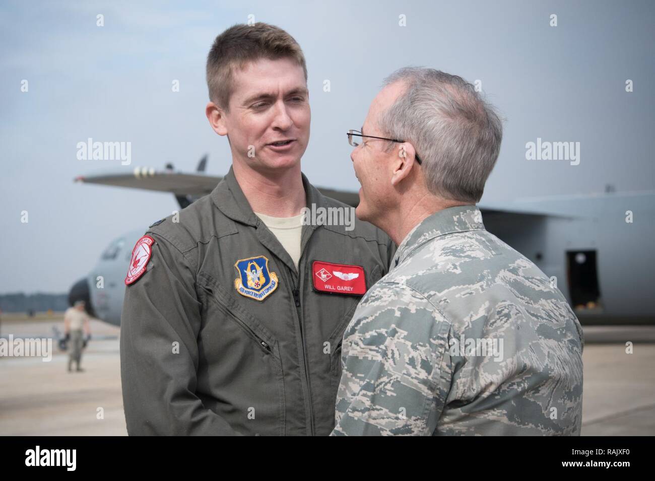 1st Lt. Will Garey, 815th Airlift Squadron pilot, talks with Maj. Gen ...