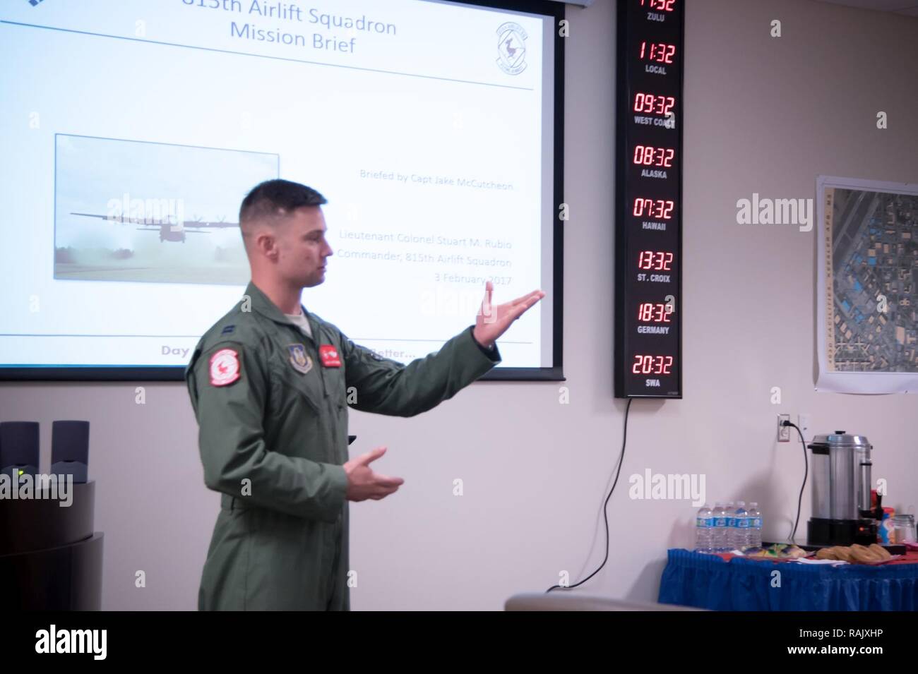 Capt. Jacob McCutcheon, 815th Airlift Squadron pilot, speaks to Maj ...
