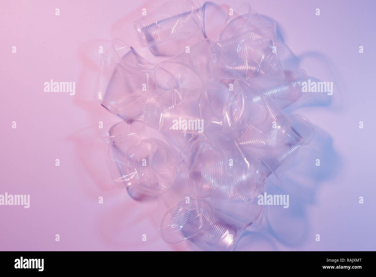 Plastic waste, Plastic cups on light background Stock Photo - Alamy