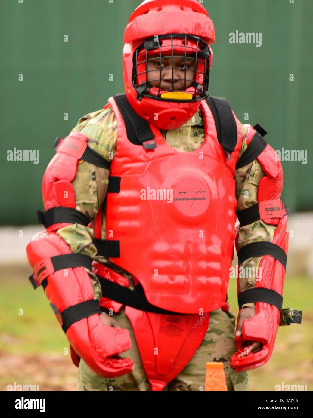Wearing the RedMan Instructor Training Suit, Sgt. Lee Miller of the U.S ...