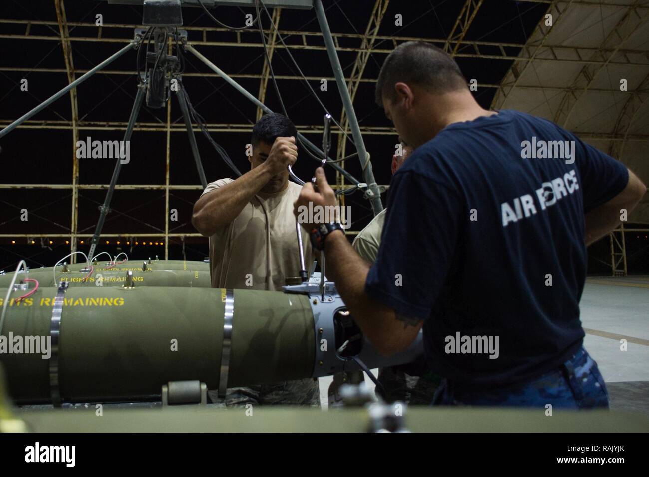 Members of the Royal Australian Air Force and U.S. Air Force construct ...