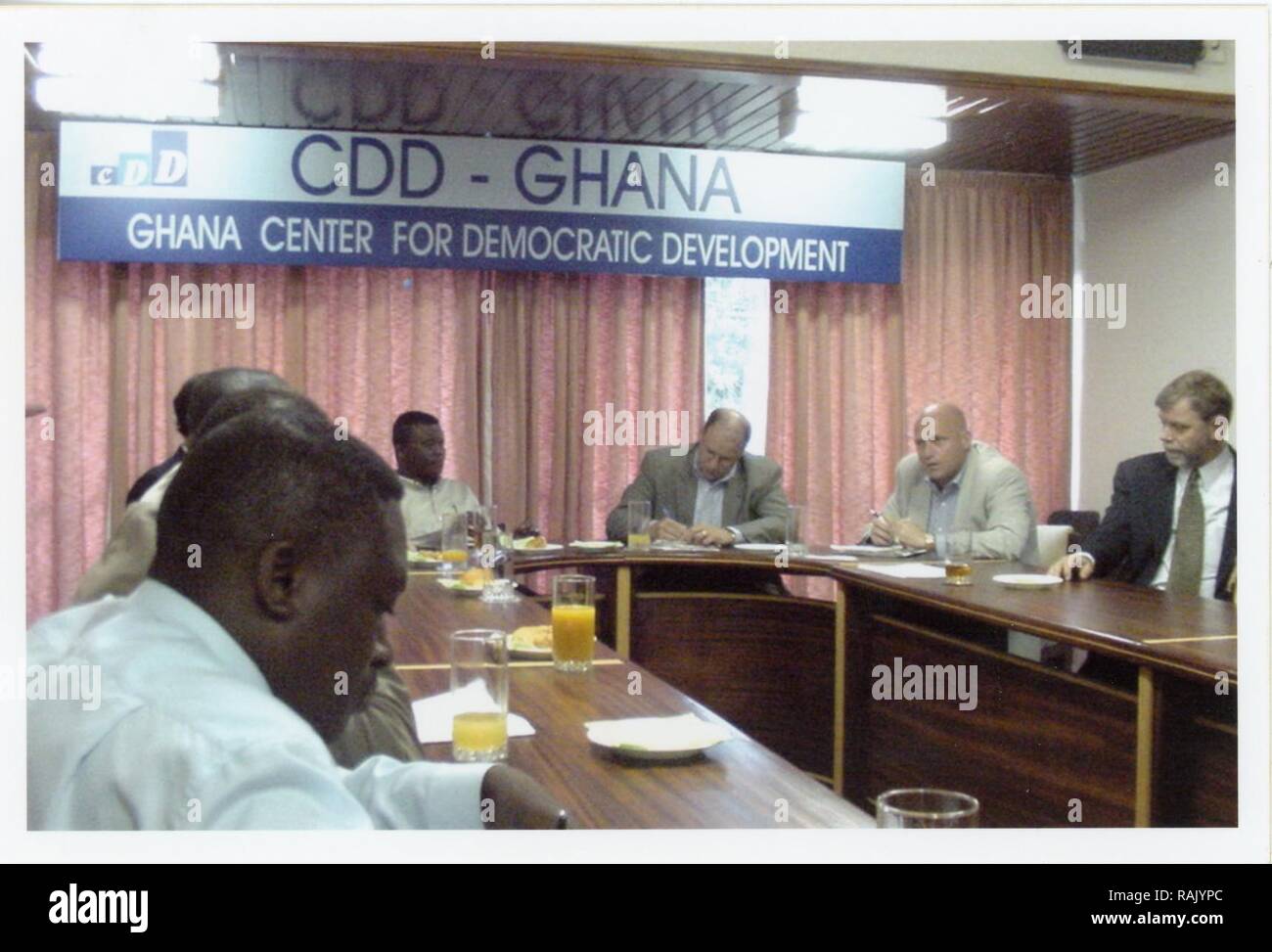 CENTER FOR DEMOCRATIC DEVELOPMENT CDD-GHANA, PEOPLE GATHERED AROUND A ...
