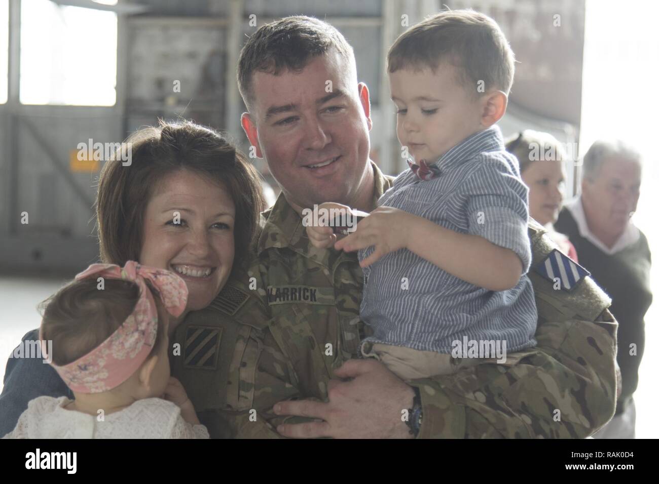 The Family of Chief Warrant Officer 2 Christopher Warrick, Troop C, 3rd ...