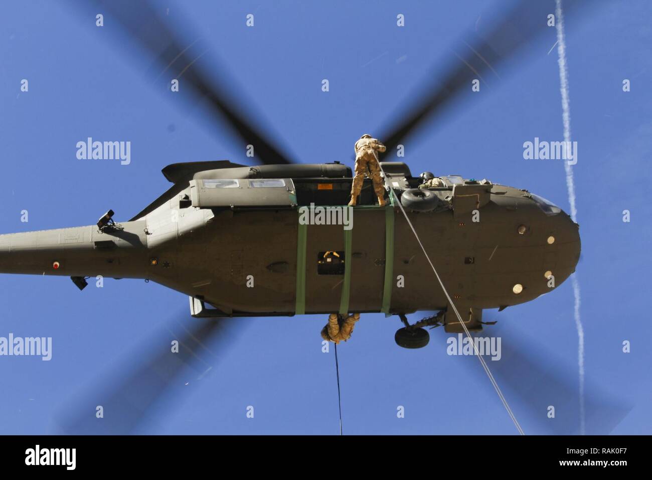Soldiers rappel from a UH-60 Black Hawk helicopter at Fort Bliss, Texas ...