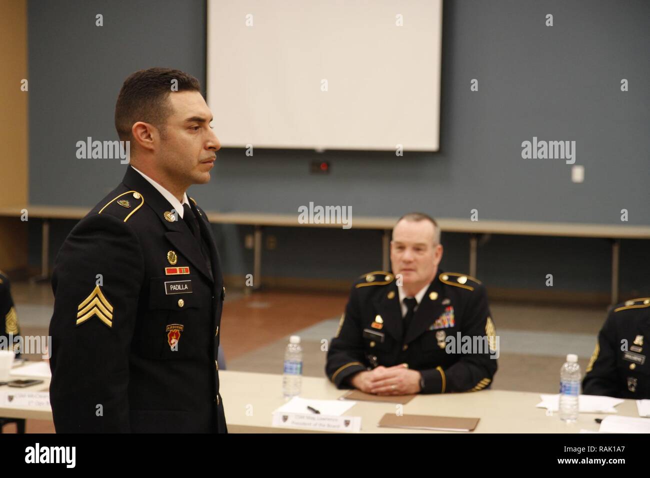 U.S. Army Reserve soldier Sgt. Juan Padilla has his uniform inspected ...