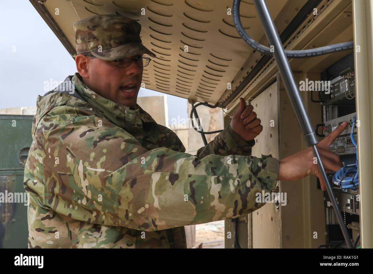 U.S. Army Sgt. Manuel E. Rosario, a multichannel transmission systems ...
