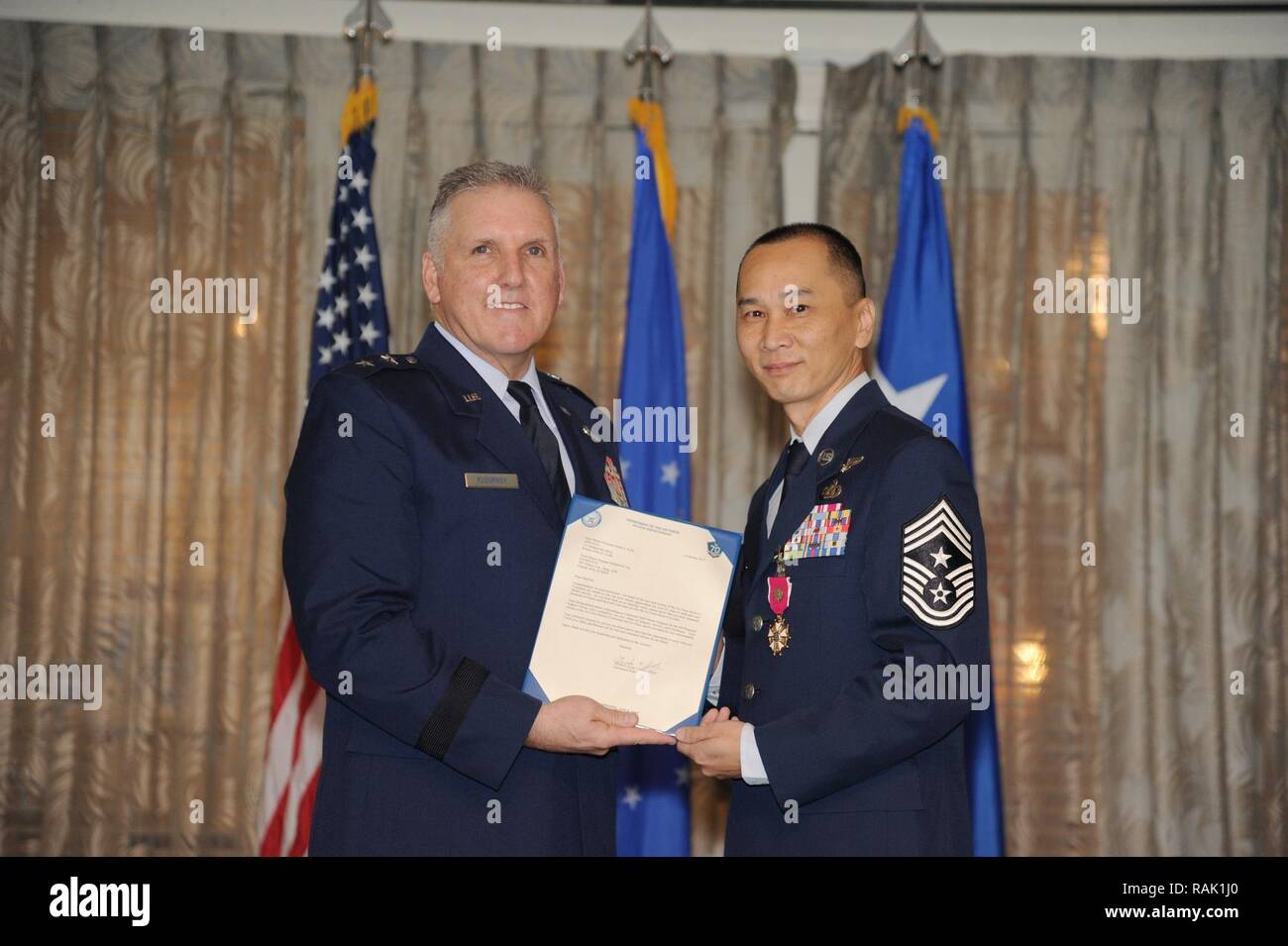 U.S. Air Force Maj. Gen. John C. Flournoy presents Command Chief Master ...
