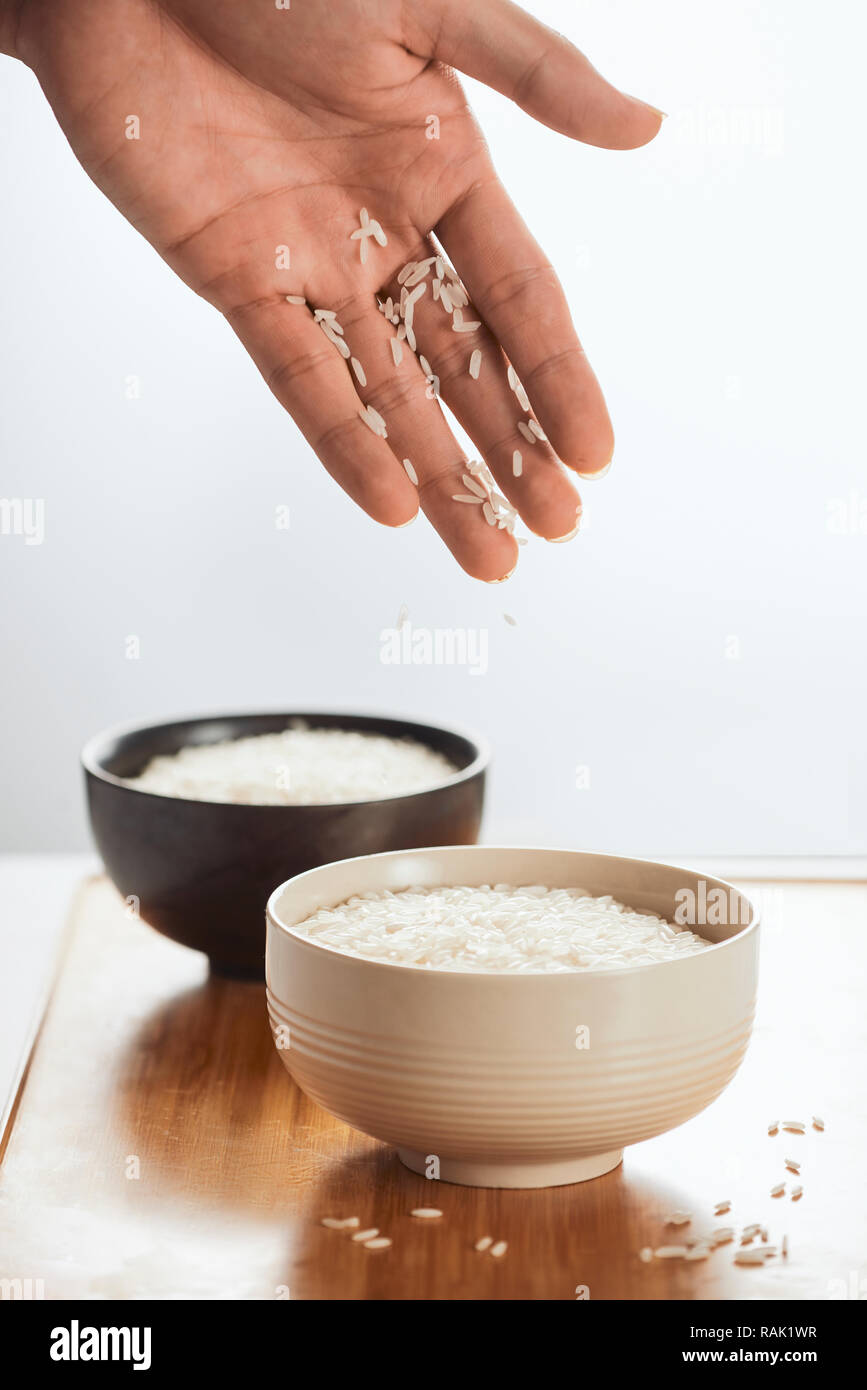 White rice in bowl on table. Concept asian food Stock Photo - Alamy