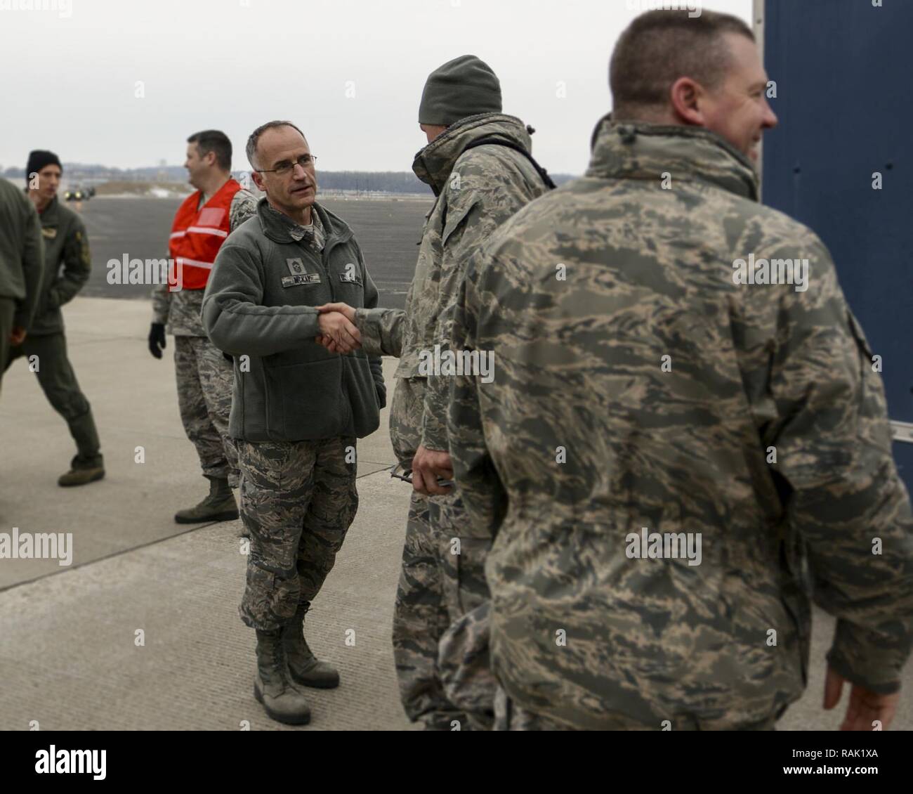 Chief Master Sgt. James McKay, 115th Fighter Wing command chief, greets ...