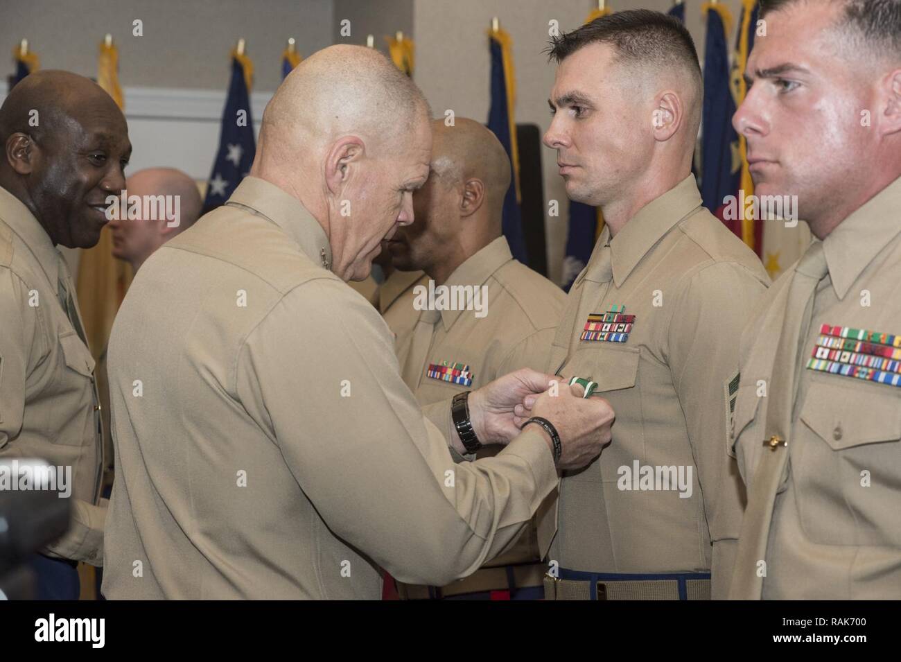 Commandant of the Marine Corps Gen. Robert B. Neller presents U.S ...