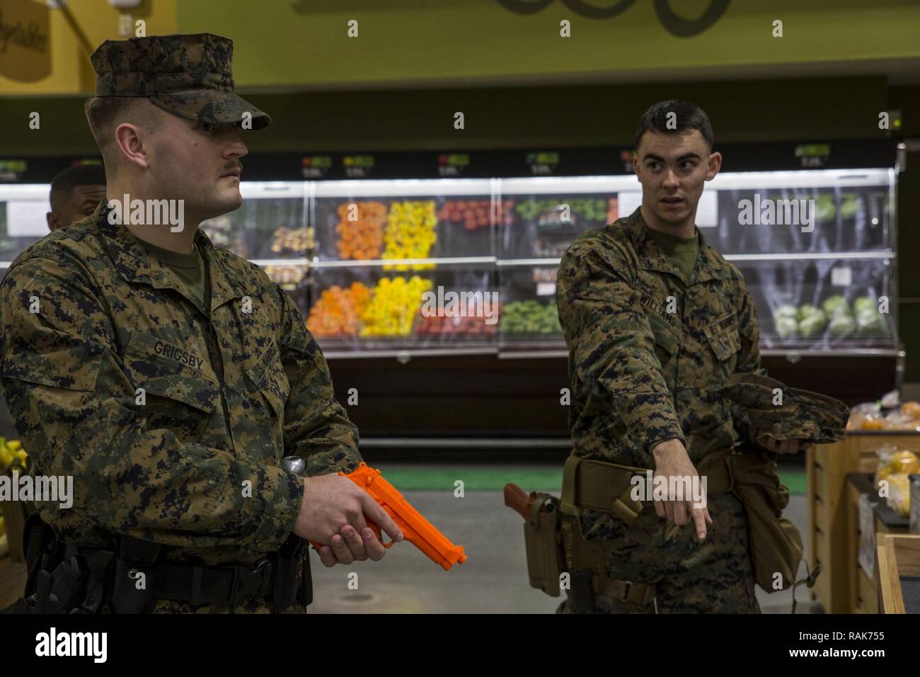 U.S. Marine Corps Lance Cpl. Justin Williams, right, a team leader with ...