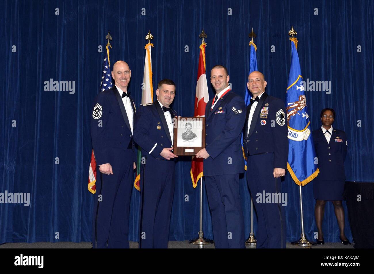 Senior Airman Wesley Escalante receives the John L. Levitow award from ...