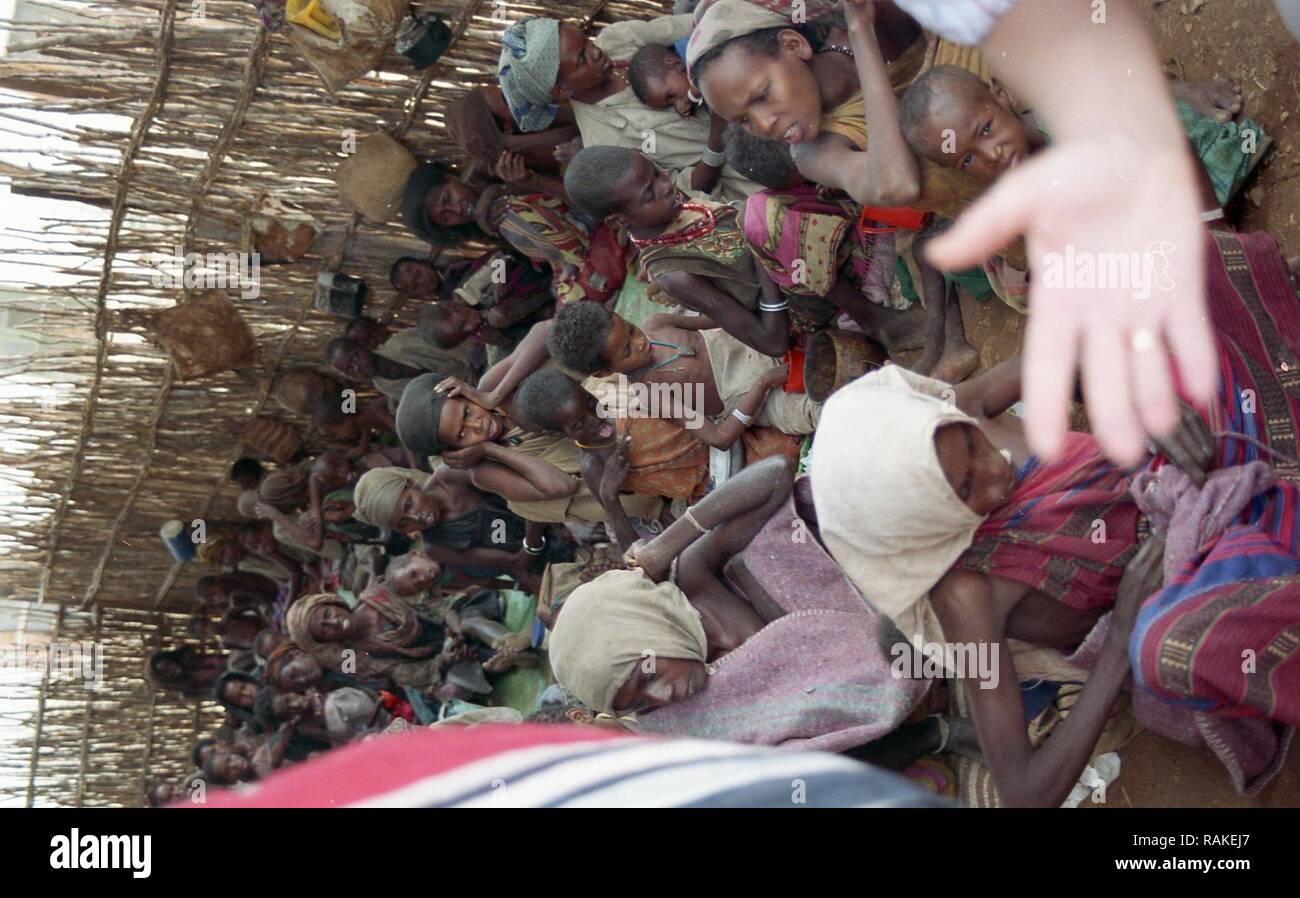 MEN WOMEN AND CHILDREN GATHERED IN AREA Stock Photo - Alamy