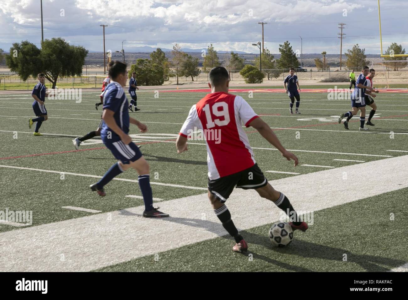 A player with Pendleton Futbol Club dribbles during a pre-season game ...