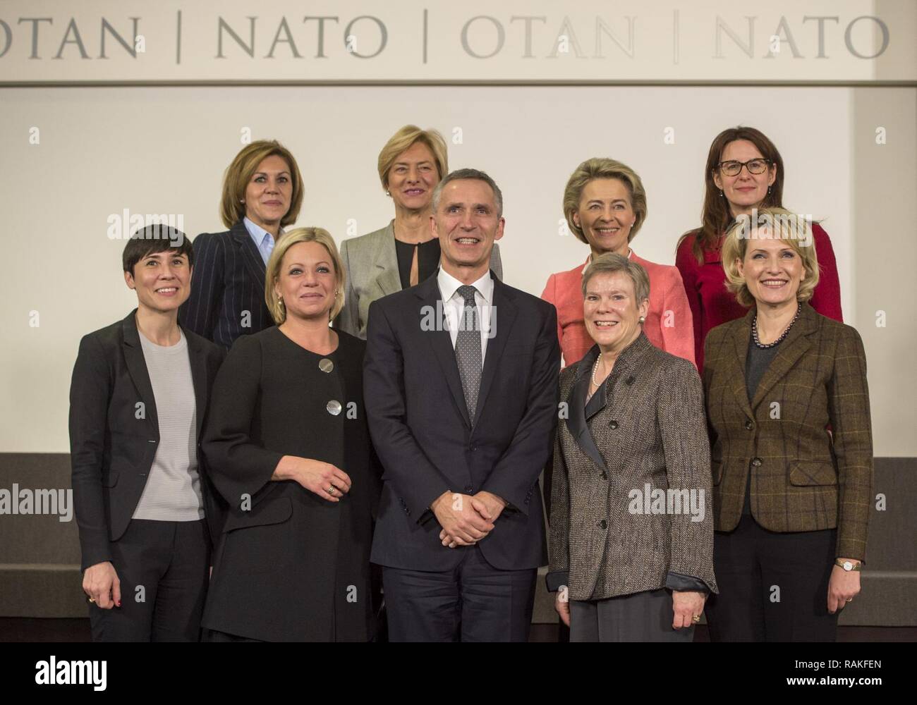 NATO Secretary General Jens Stoltenberg poses for a photo with female ...