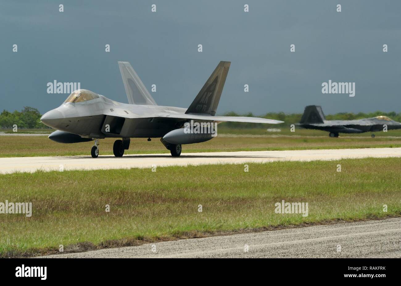 A U.S. Air Force F-22 Raptor assigned to the 90th Fighter Squadron ...