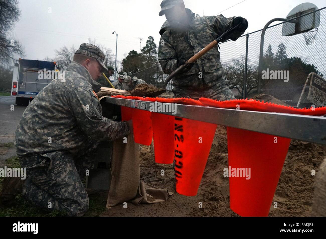 Working in heavy rain, Soldiers from Delta Company, 1-184th Infantry ...