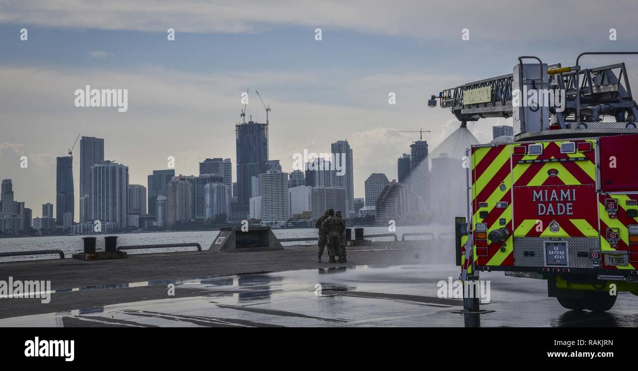 The sun sets at the Port of Miami, Feb. 18, 2017, as U.S. Army Reserve ...