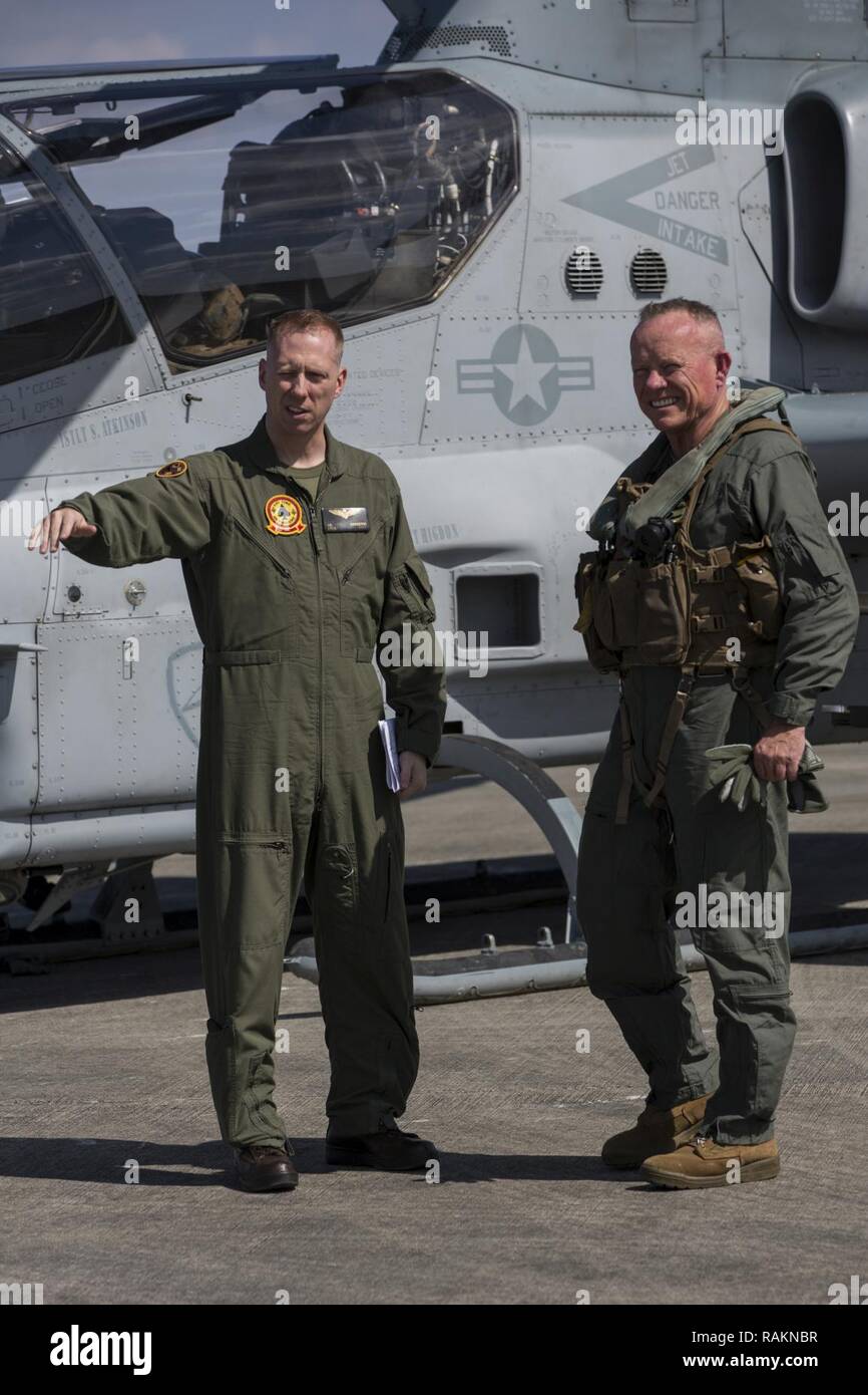 U.S. Marine Corps Lt. Gen. Lawrence Nicholson, right, talks to Lt. Col ...