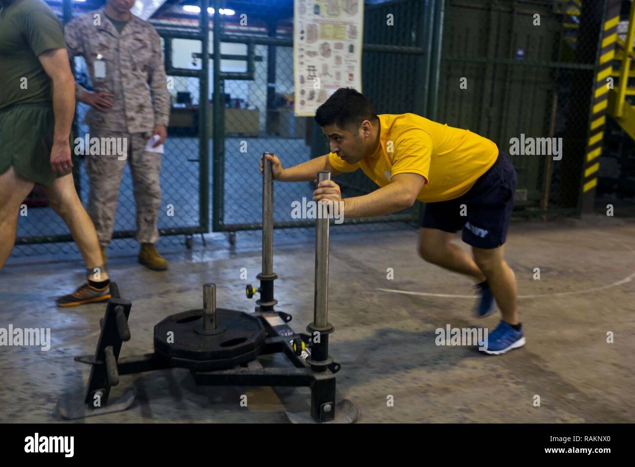 U.S. Navy Petty Officer 2nd Class Jason Ramirez, a corpsman with Naval ...