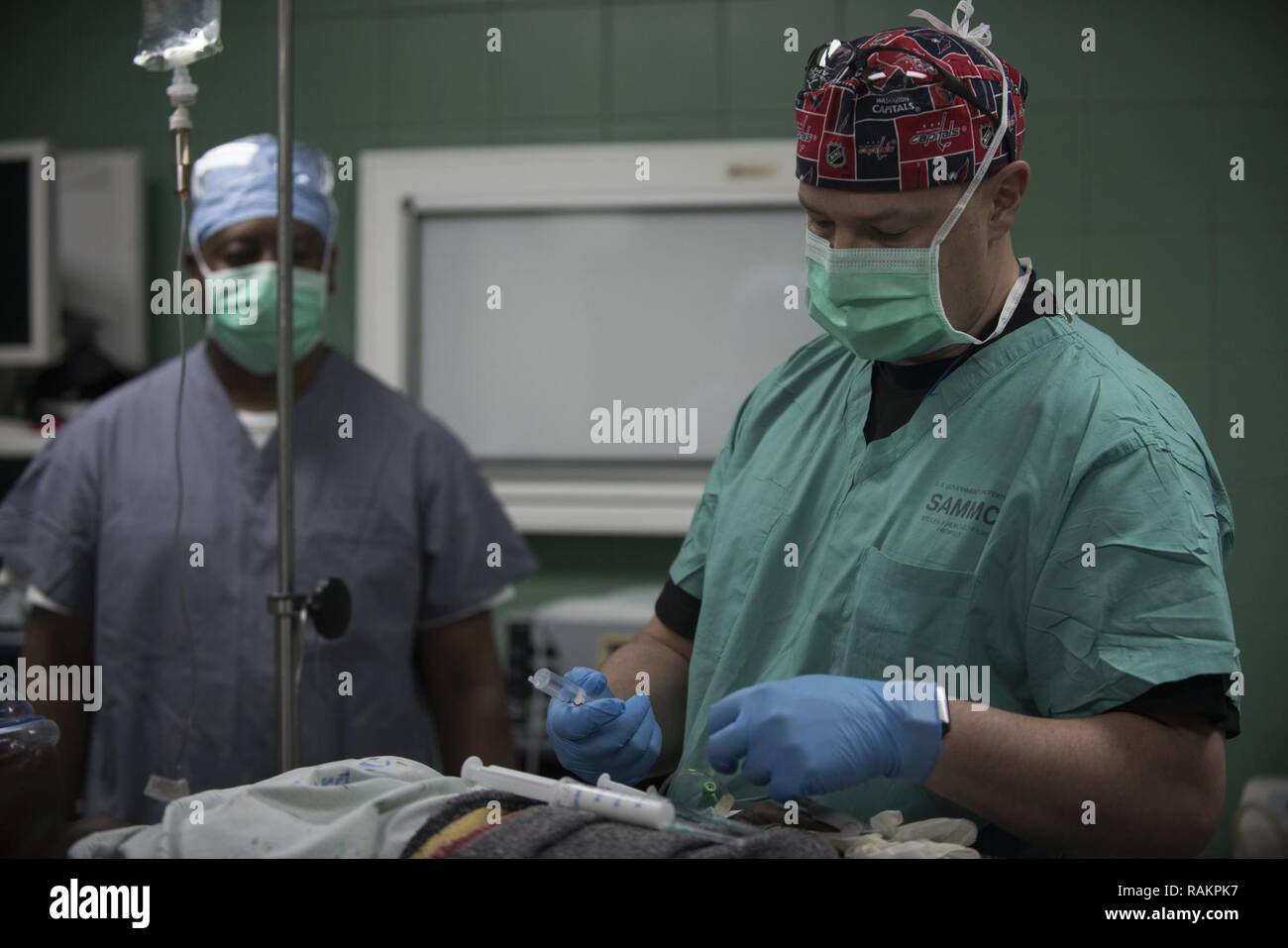 U.S. Army Maj. Keith Lathrop, a nurse anesthetist, assigned to Brooke ...