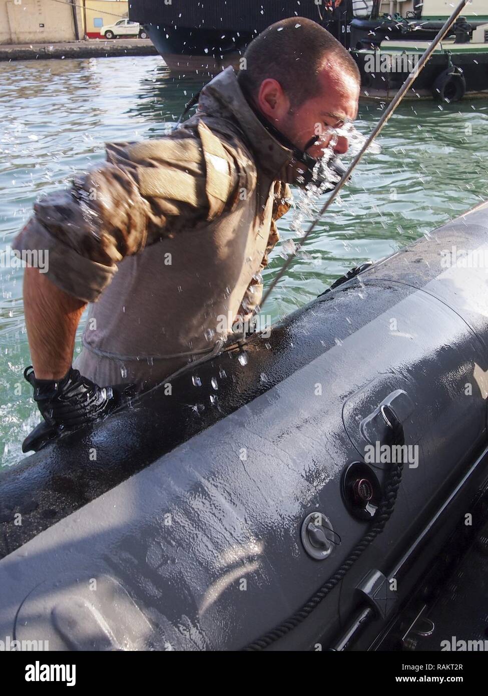 U.S. Navy Explosive Ordinance Disposal Mobility Unit (EODMU) personnel ...