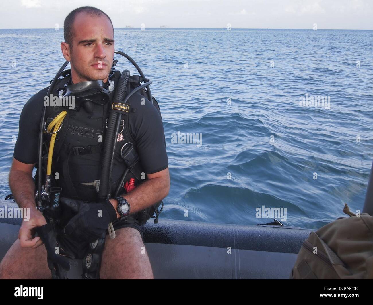 U.S. Navy Explosive Ordinance Disposal Mobility Unit (EODMU) personnel ...