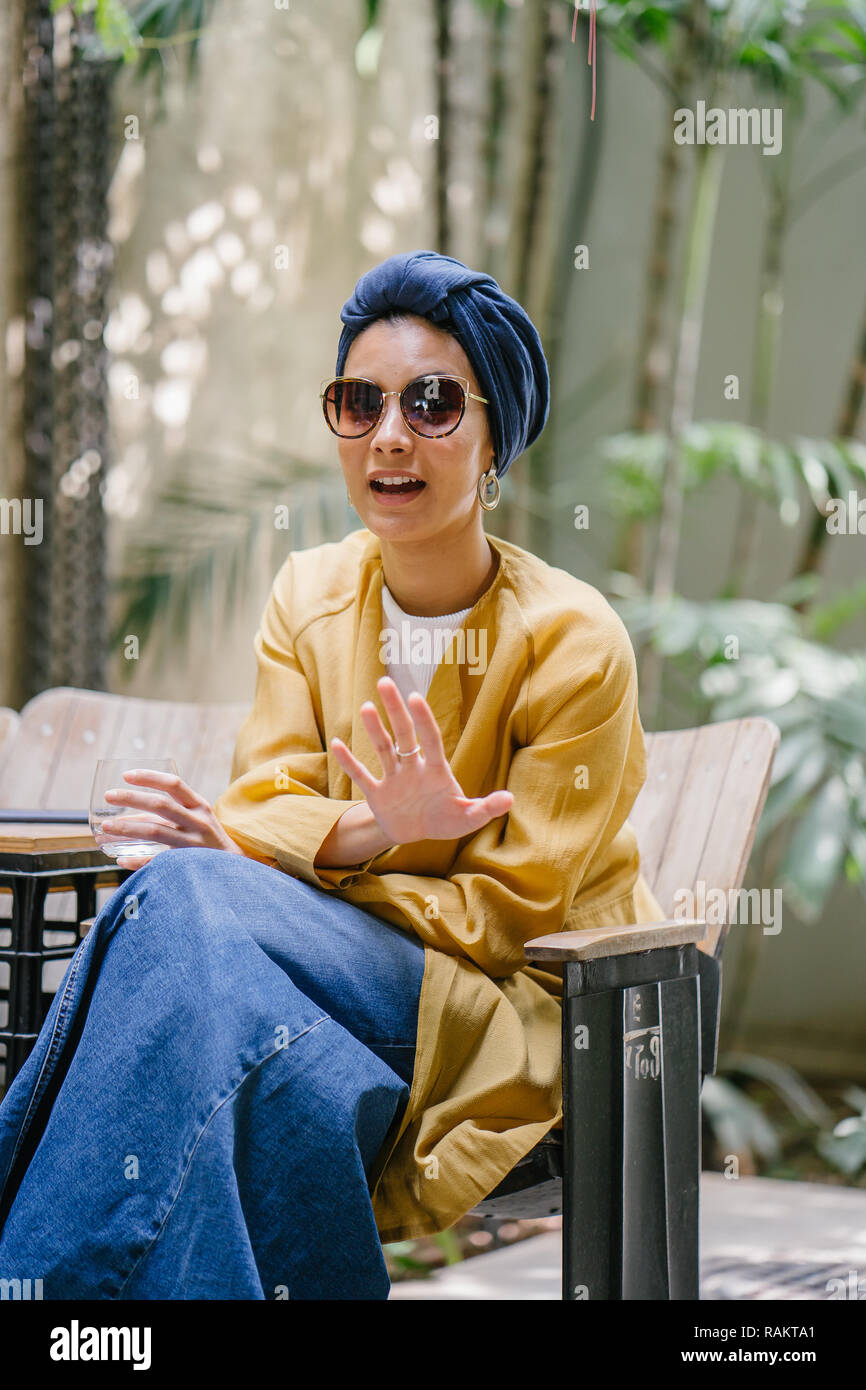 Fashion portrait of a young and beautiful Malay Asian woman (Muslim) in ...