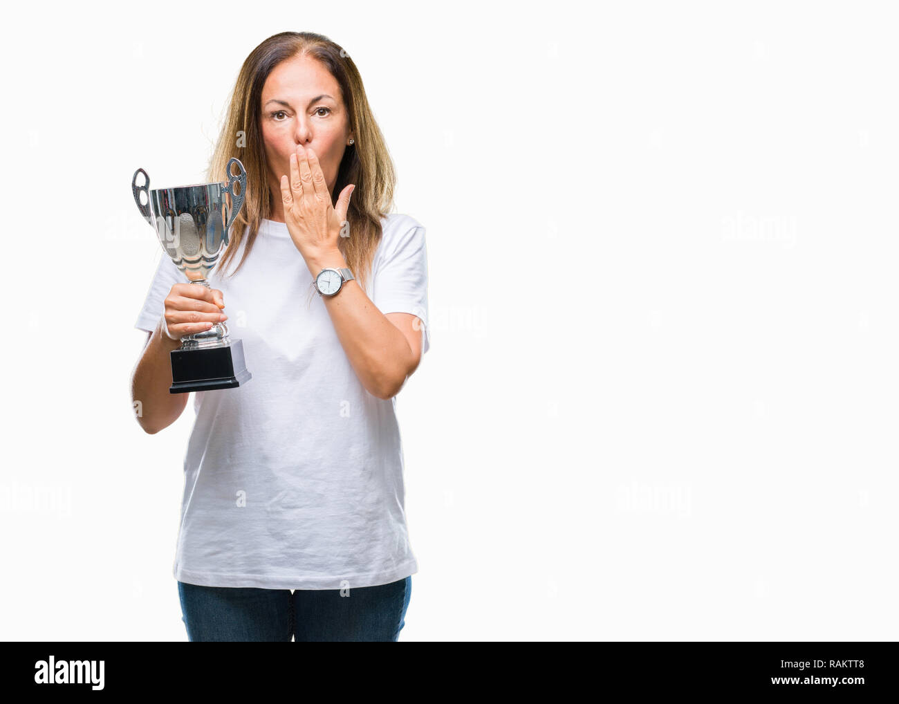 Middle age hispanic winner woman celebrating award holding trophy over ...