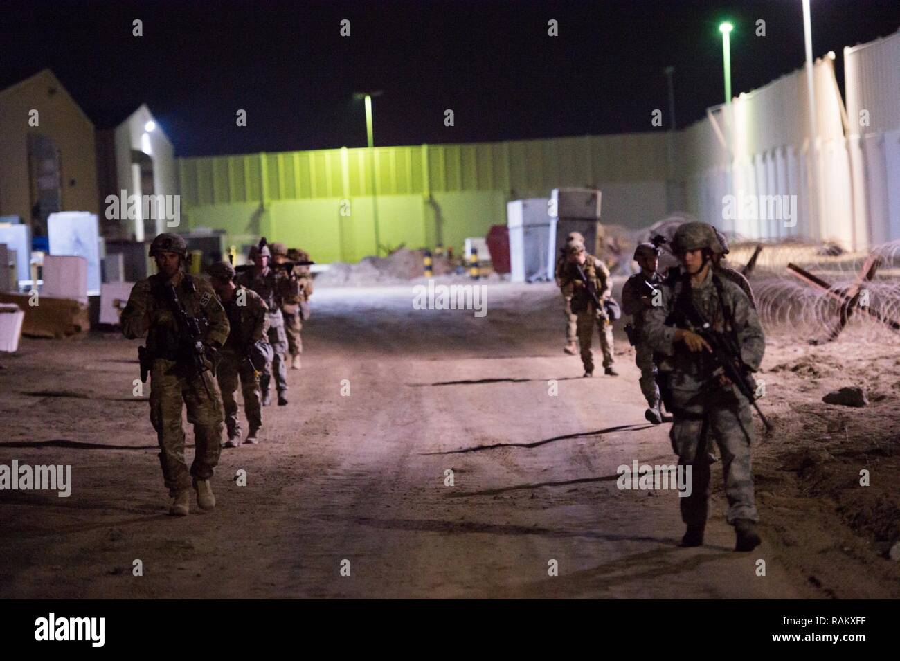 Members of the 380th Expeditionary Security Forces Squadron complete an ...