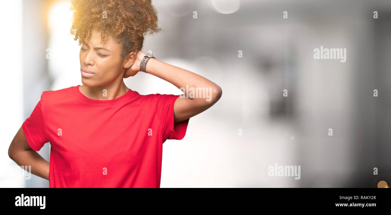 Beautiful young african american woman over isolated background ...