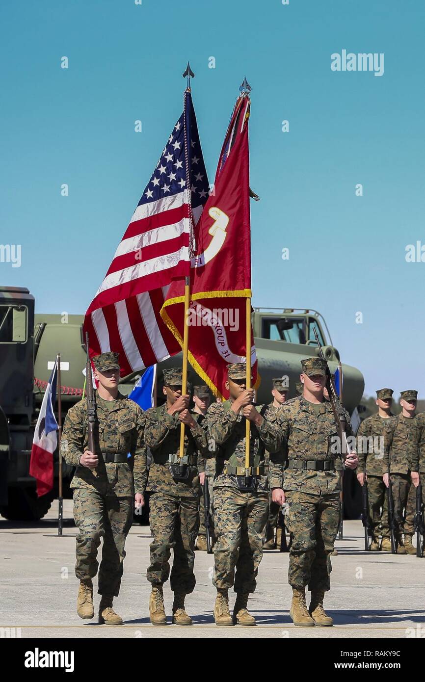 A color guard presents the colors during the Marine Aircraft Group 31 ...