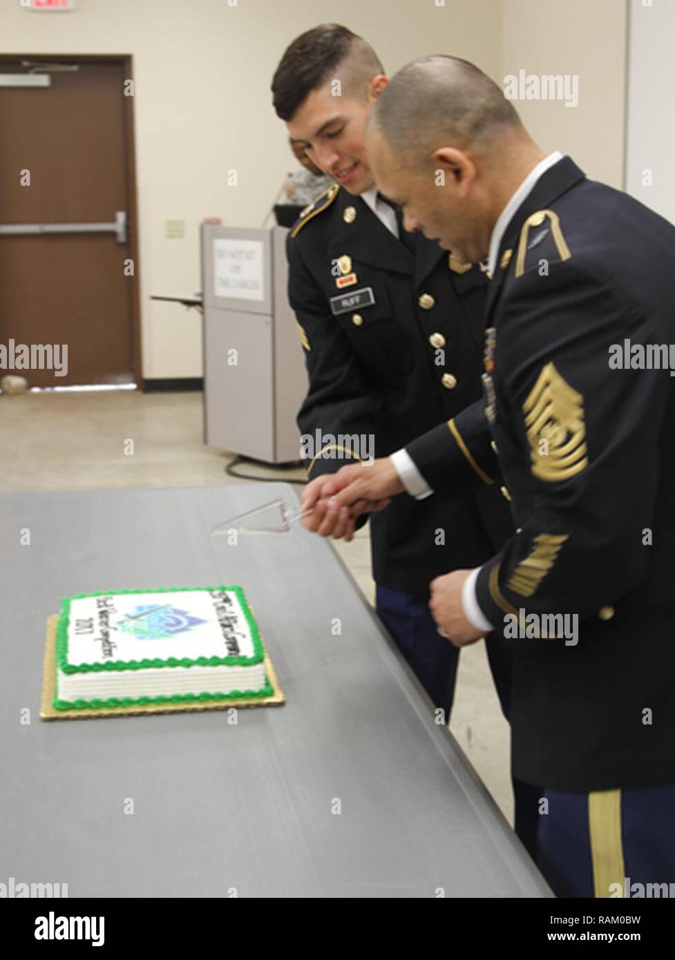Sgt. Christopher Ruff of the 321st Civil Affairs Brigade (left) and ...