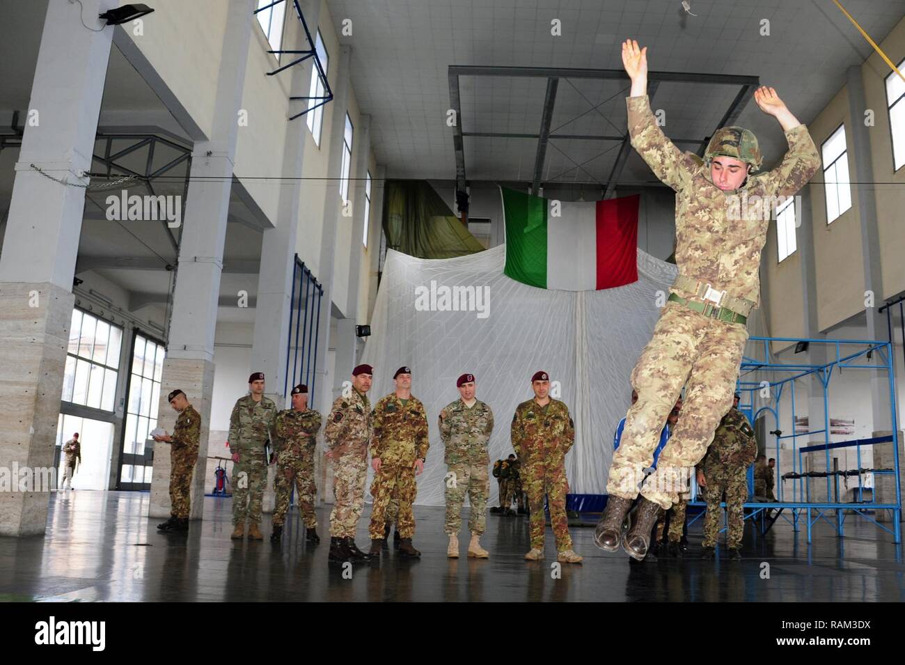 An Italian soldier from Italian Army Folgore Brigade conducts pre-jump ...