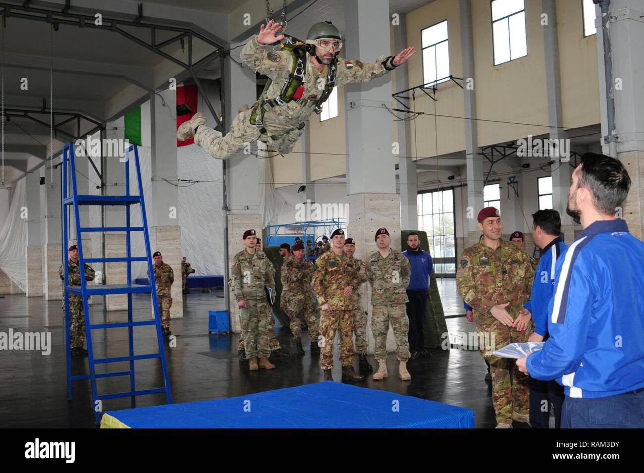 An Italian soldier from Italian Army Folgore Brigade conducts pre-jump ...