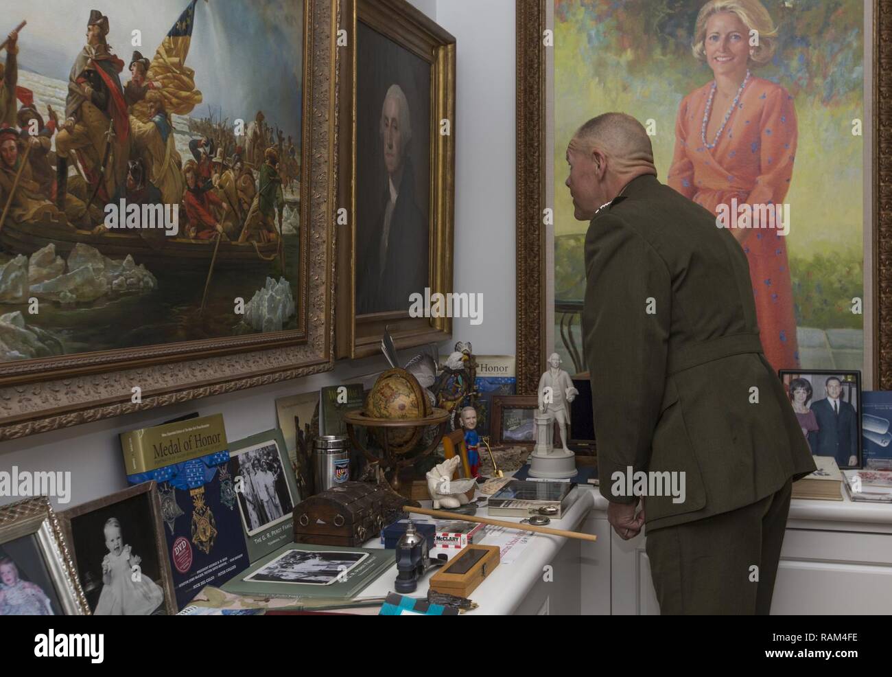 Commandant of the Marine Corps Gen. Robert B. Neller looks at a ...