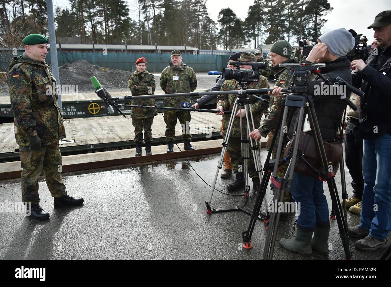 Left, the deputy commander of German 122nd Mechanized Infantry ...