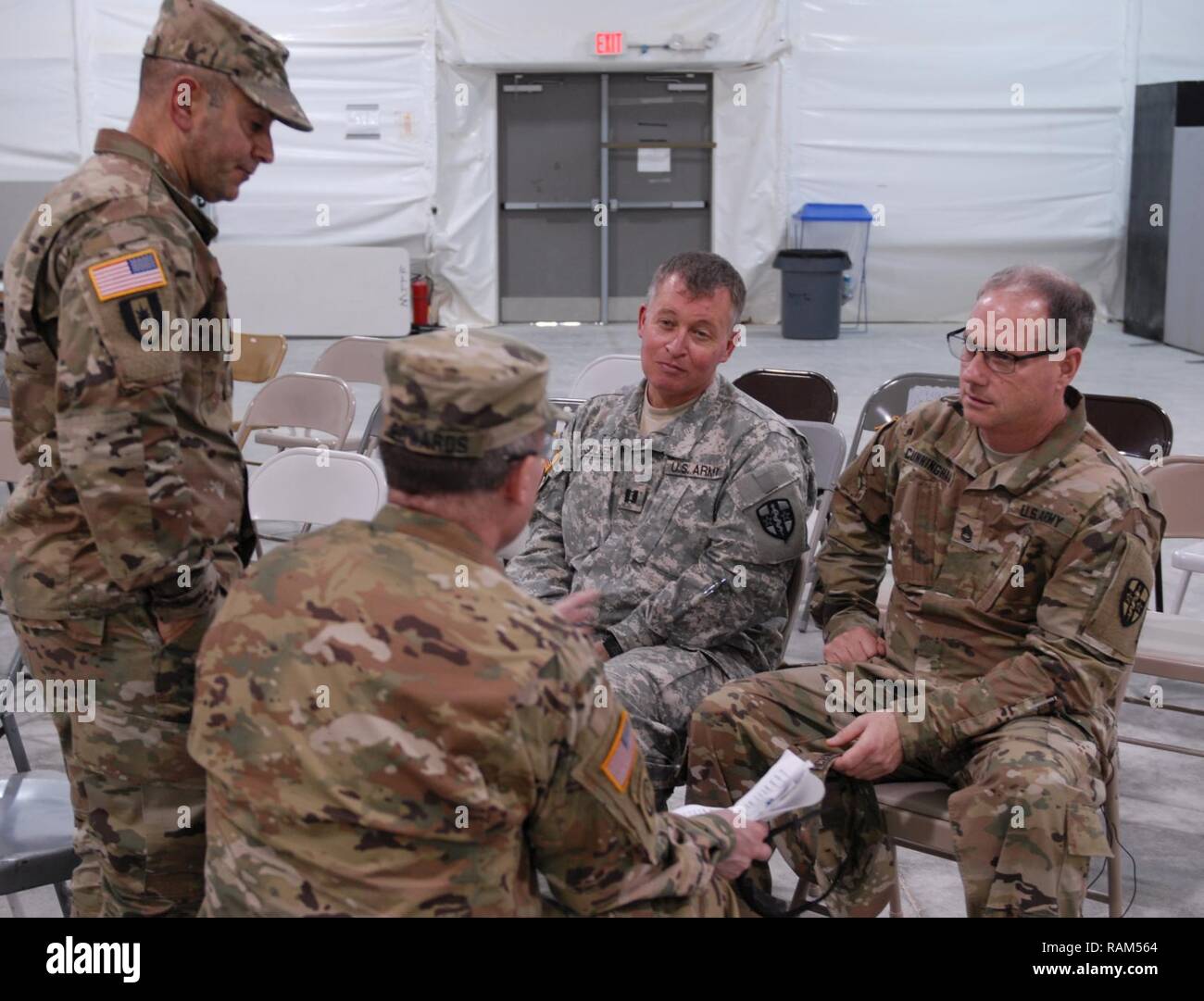 Capt. Dennis Consolver and Sgt. 1st Class John Cunningham, U.S. Army ...