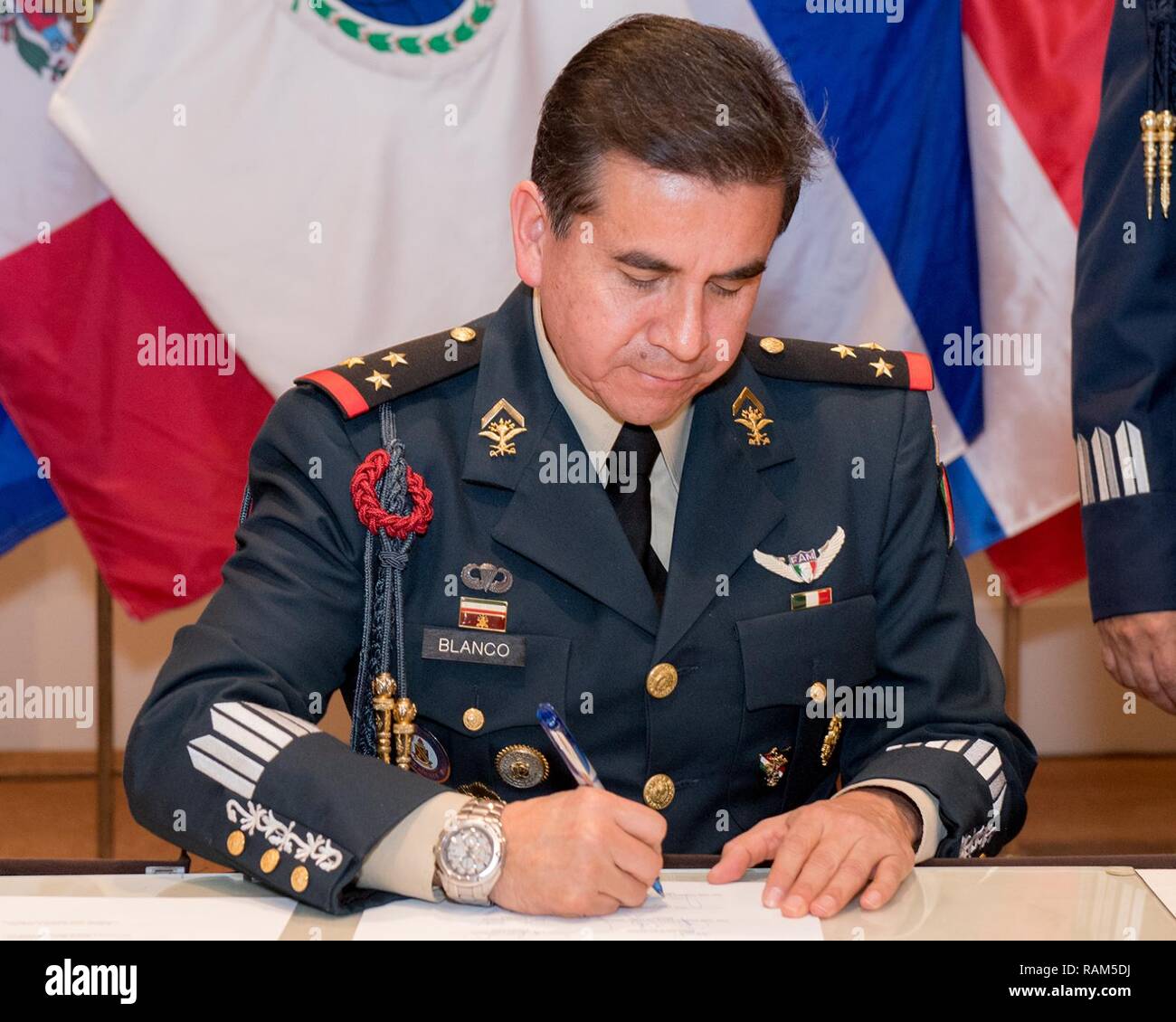 Mexican army Col. Homero Blanco signs the agree actions from Mexico ...