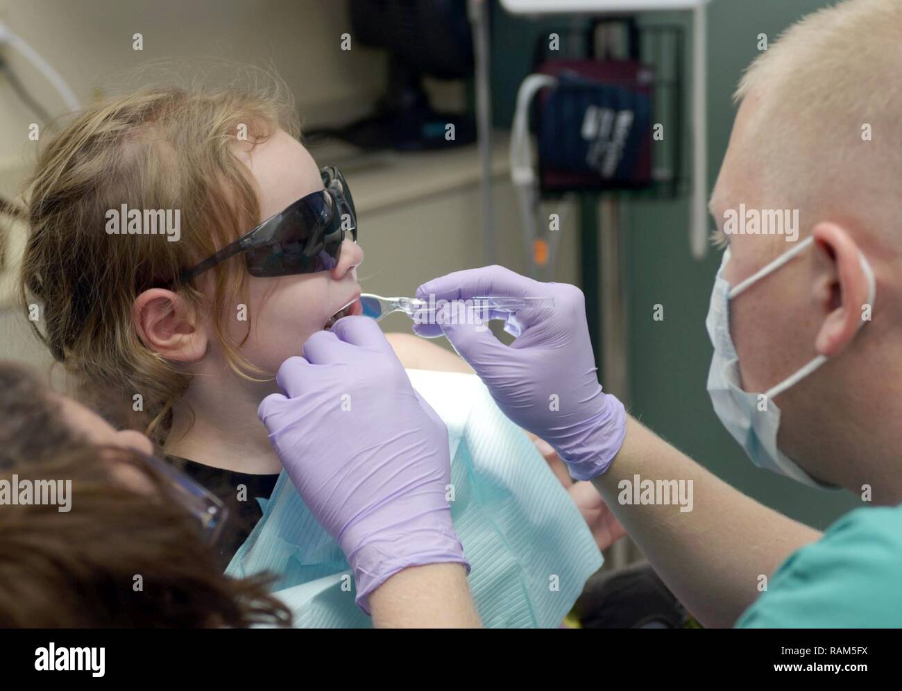 Emily Rusnak, daughter of Cari and Staff Sgt. Michael Rusnak, an ...
