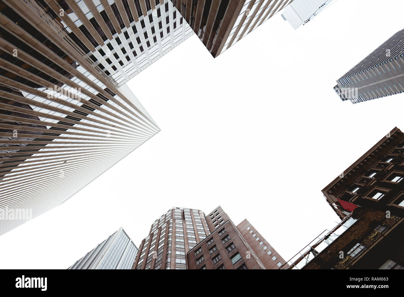 bottom view of skyscrapers and clear sky in new york city, usa Stock ...