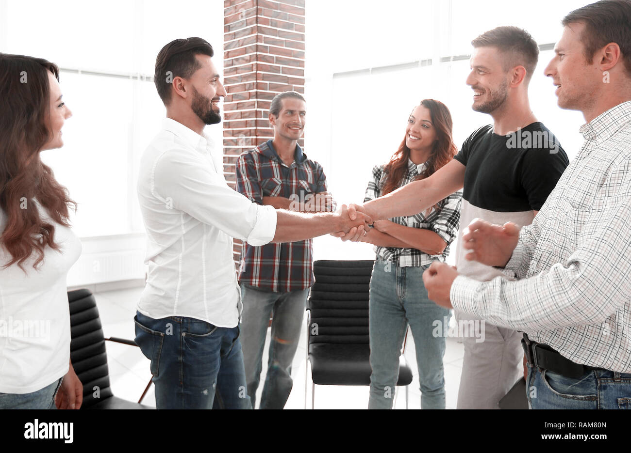 view from the top.handshake of businessmen Stock Photo - Alamy