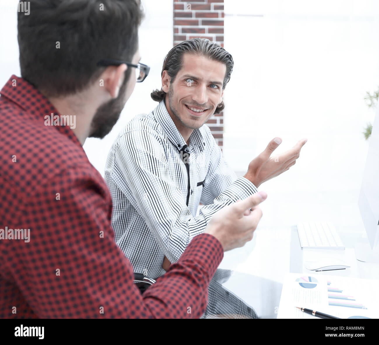 two employees work in the office Stock Photo - Alamy