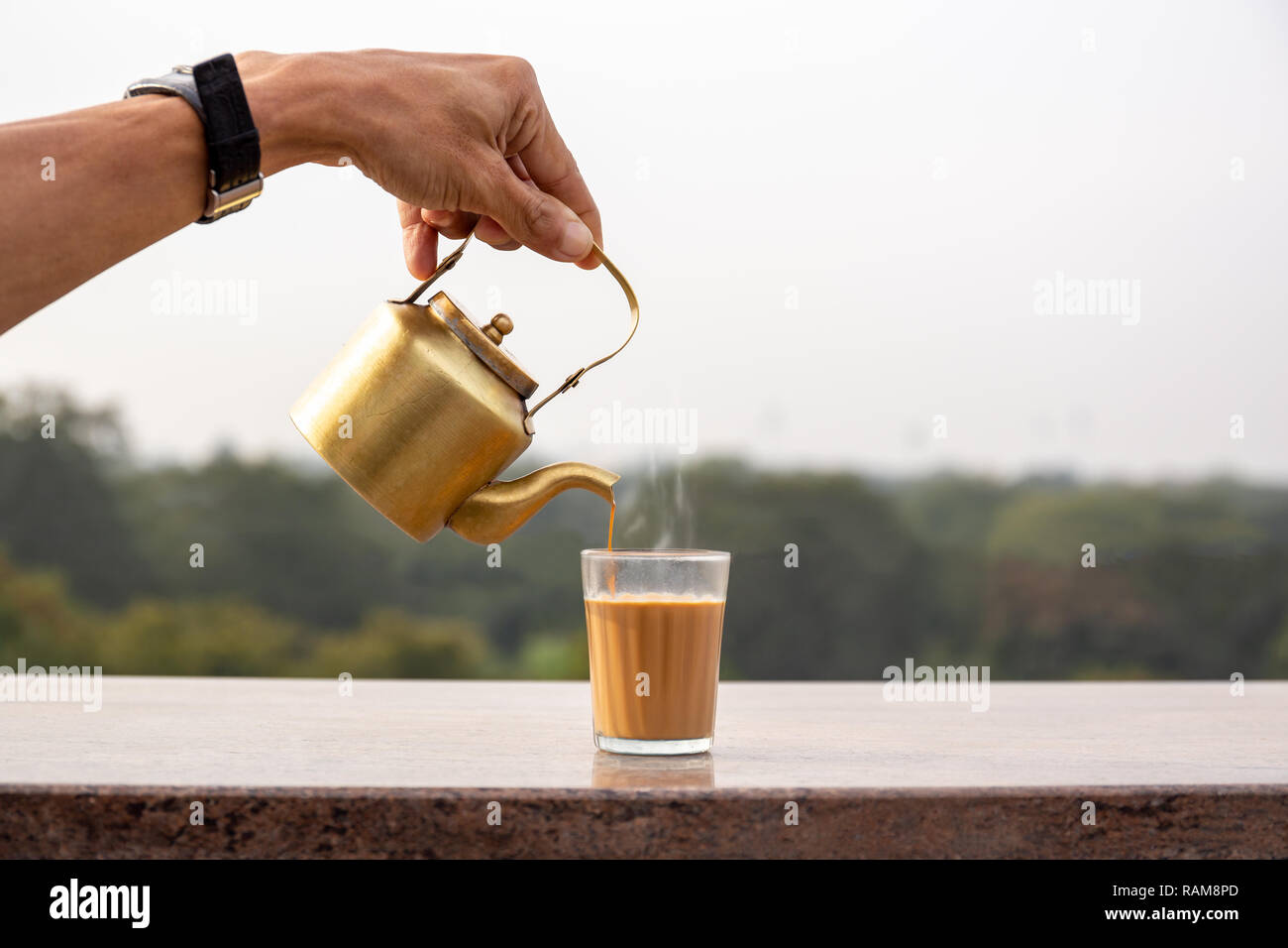 Pouring masala tea hi-res stock photography and images - Alamy