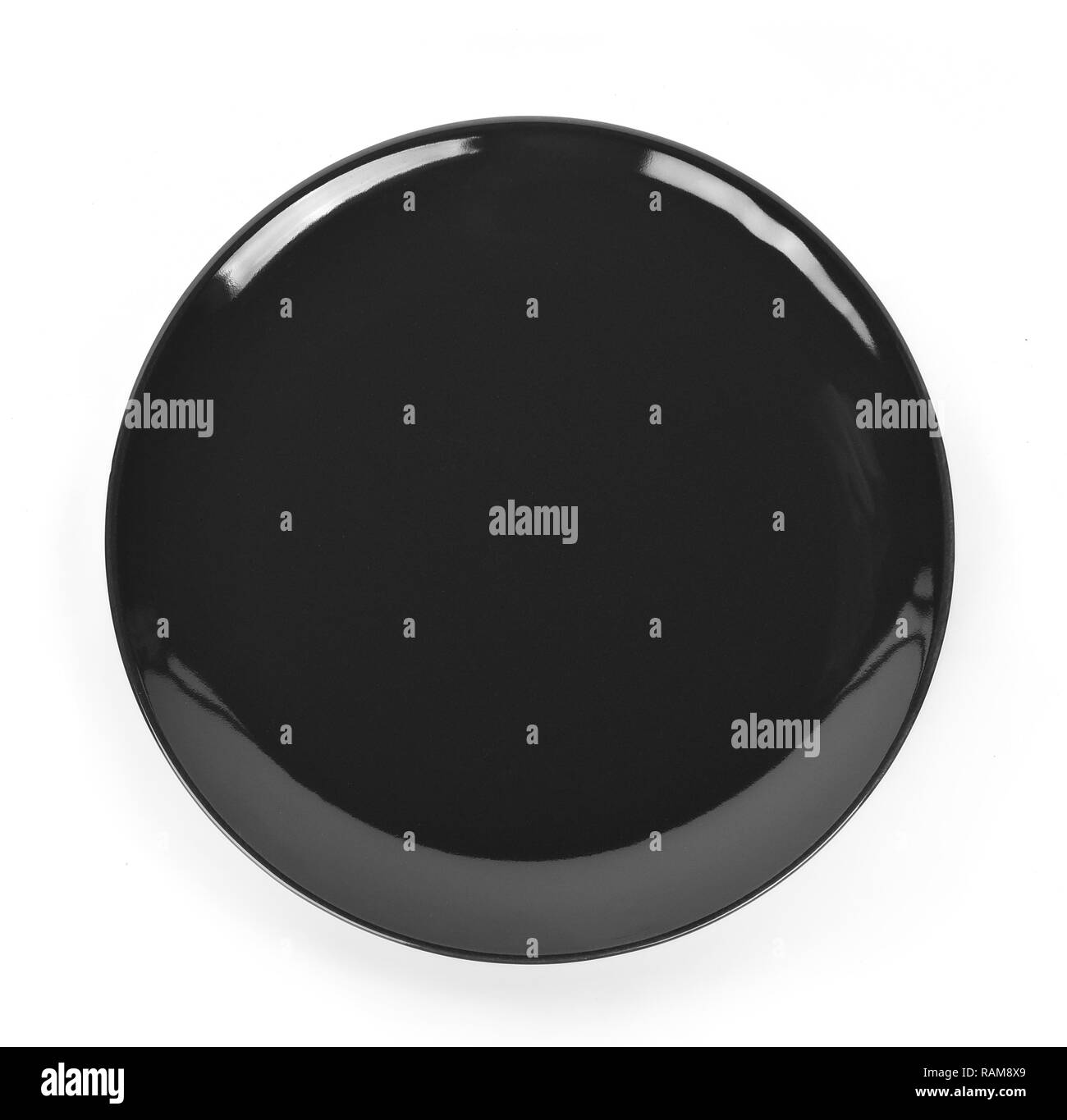 Black plate isolated on white background, top view Stock Photo - Alamy