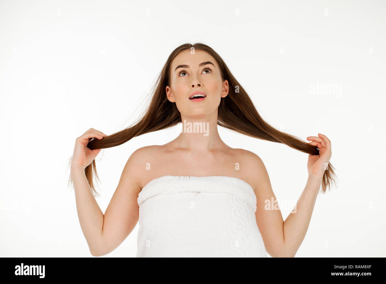 Portrait of a bared beautiful woman getting ready for the spa treatment ...