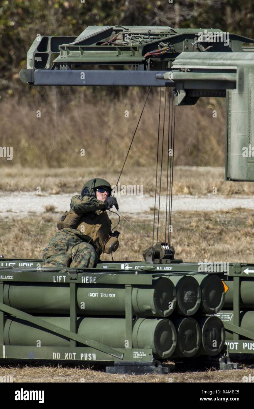 A U.S. Marine with Fox Battery, 2nd Battalion, 14th Marine Regiment ...