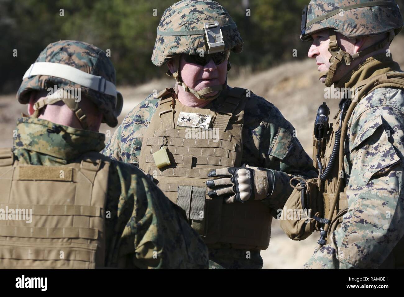 U.S. Marine Corps Maj. Gen. Walter Miller, center, commanding general ...