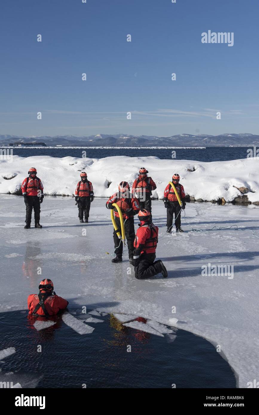 Members of the U.S. Coast Guard ice rescue team participate in training ...
