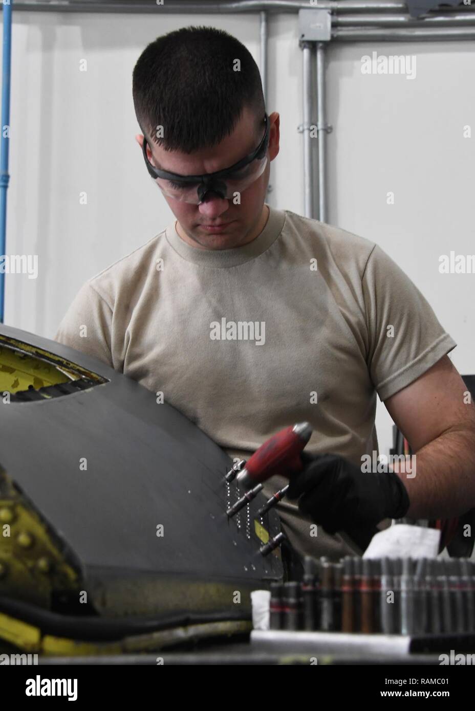 U.S. Air Force Airman 1st Class Stephen Hunter, an aircraft structural ...